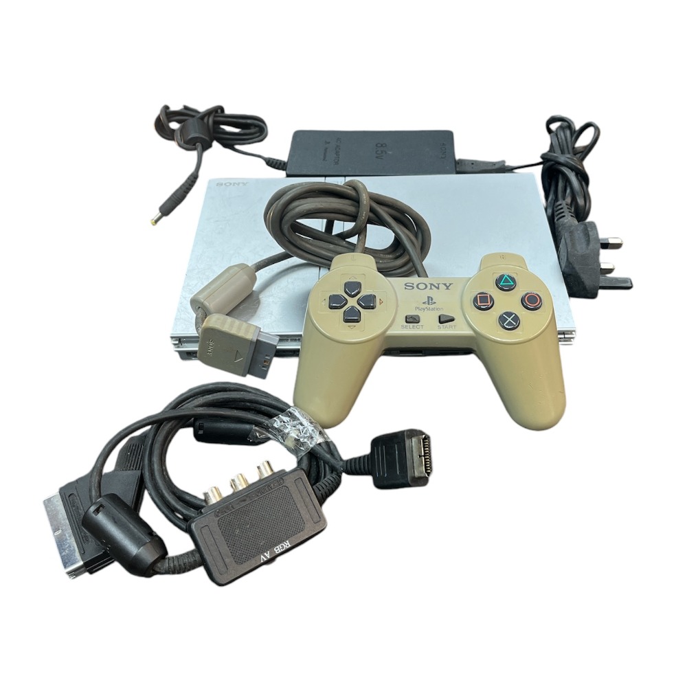 Pre-owned PS2 Slim Silver with PS1 controller - Own4Less